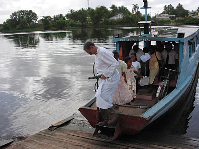 Fr. Russ disembarks after a riverboat journey; a main method of ...
